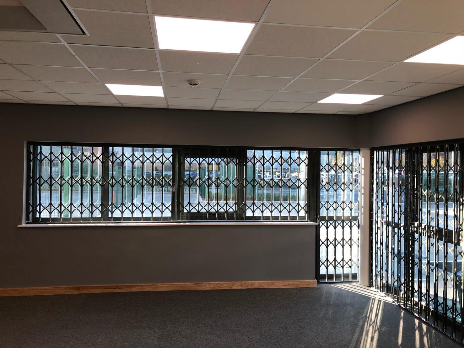 Security grilles for commercial units - Cross-Guard